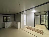 China Modernist Deep Charcoal Living Module with Full Height Panoramic Window and Luxury Backyard Guest Studio for sale