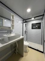 China Modernist Deep Charcoal Living Module with Full Height Panoramic Window and Luxury Backyard Guest Studio for sale