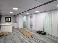 China 40ft Expandable Prefab Container House with Wood Grain Exterior for Fuji Mountain Cherry Blossom Lakeside Homestay for sale