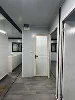 China Modernist Obsidian Gray 20ft Expandable Container House 38.2m² with Broken Bridge Aluminum Glass Door for sale