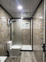 China 30FT Suburban Estate Expandable Container House – Textured White Block Edition for sale