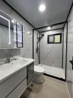 China 30FT Eco-Minimalist Expandable Container House – Smooth Panel Edition for sale