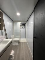 China 30FT Tropical Resort Expandable Container House – Pitched Roof & Veranda Edition for sale