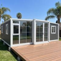 China 20FT Modern Studio Expandable Container House – Charcoal Grid-Glass Edition for sale