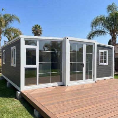 China 20FT Modern Studio Expandable Container House – Charcoal Grid-Glass Edition for sale