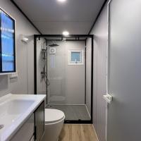 China 20FT Modern Studio Expandable Container House – Charcoal Grid-Glass Edition for sale