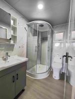 China 20ft Expandable Container House for Workforce Housing - Secure Grey Edition for sale
