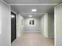 China 20ft Expandable Container House for Workforce Housing - Secure Grey Edition for sale