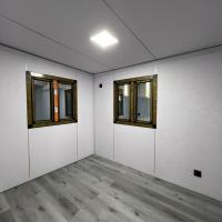 China 20ft Expandable Container House for Brazil Eco-Resorts - Modern Wood & Black Finish for sale