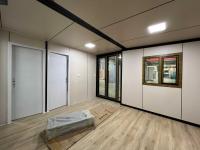 China 20ft Expandable Container House for UK Garden Annexes - Deep Wood & Black Edition for sale