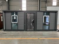 China 20ft Expandable Container House for Scottish Highland Retreats - Secure Charcoal Edition for sale
