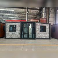 China 20ft Expandable Container House with Stone-Texture Cladding and Dark Grey Frame for sale