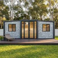 China 20ft Expandable Container House with Stone-Texture Cladding and Dark Grey Frame for sale