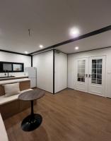China 20FT Gable Roof Expandable Container House 5900x6700x2560mm 75mm EPS Wall SPC Flooring for Living Rental Resort for sale