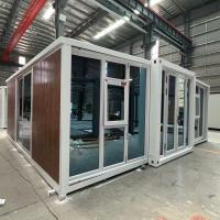 China 20ft Expandable Container House with Wood-Grain Cladding and Full-Height Glazing for sale