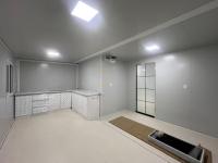 China 20ft Expandable Container House with Grey Cladding and Fitted Kitchen Cabinets for sale