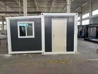 China 20ft Expandable Container House with Dark Charcoal Cladding, White Frame and Casement Windows for sale
