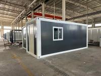 China 20ft Expandable Container House with Dark Charcoal Cladding, White Frame and Casement Windows for sale