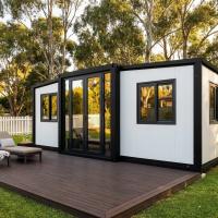 China 20ft Expandable Container House with White Cladding, Black Frame and Glass Entrance Doors for sale