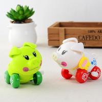 China 5cm high Cheap Christmas toy for children white green wind up pig for sale