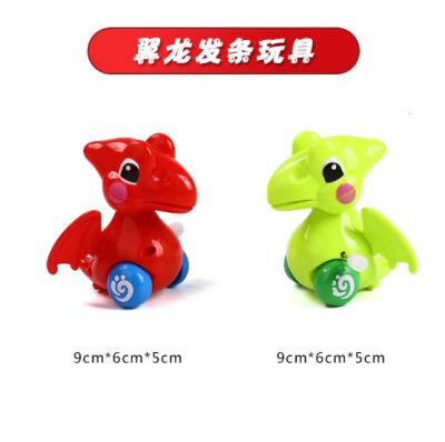 China 9cm 0.06kg Plastic Wind Up Toys Pterosaur Shaped Red / Green Color Optional for sale
