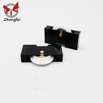 China Heavy Duty Plastic Door Roller Wheels Hardware Replacement Parts 50KG Capacity for sale