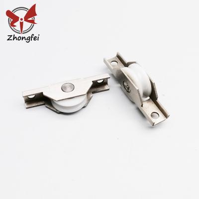 China UPVC Sliding Wardrobe Wheels Stainless Steel Pocket Door Rollers Replacement for sale