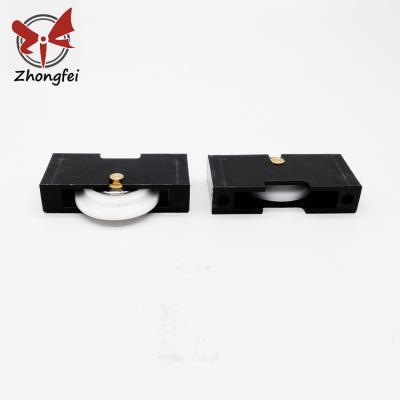 China Adjustable Plastic Casing Single Nylon Sliding Roller Low Noise Pulley For UPVC & Aluminum Window for sale