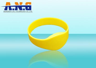 China Yellow Flexible Rfid Silicone Bracelet Comfortable With 10 Years Endurance for sale