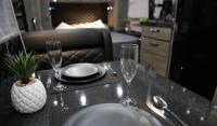 China Lightweight Luxury Off Road Camper Trailer Integrated Sink And Spacious Seating Area for sale