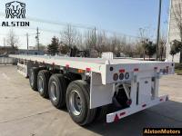China 4 Axle Flatbed Trailer with 12 Locks for Rwanda – Factory Price for sale