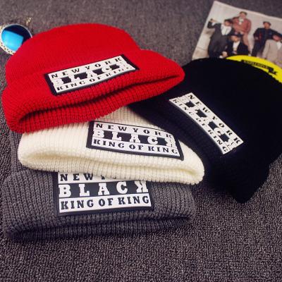 China Unisex Acrylic Knitted Cuffed Winter Beanie Hats Plain Blank Dyed Solid Color for sale