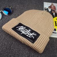 China Unisex Acrylic Knitted Cuffed Winter Beanie Hats Plain Blank Dyed Solid Color for sale