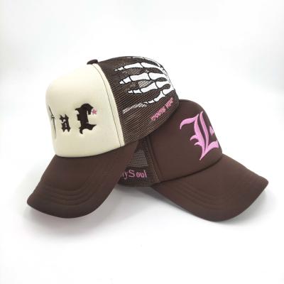 China Personalize Sport Patterns Custom Embroidery Trucker Hats Skull Bone Hand Embroidered On Side 5 panel Snapback for sale