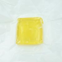China Lightweight Hot Melt PSA Adhesive Blocks 0.5-5kg for Courier Bag Sealing with High Initial Tack and Shear Strength for sale