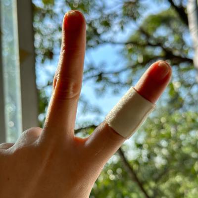China 1024mm Wide White Cotton Single Sided Hot Melt Tape 280um for Finger Protection for sale