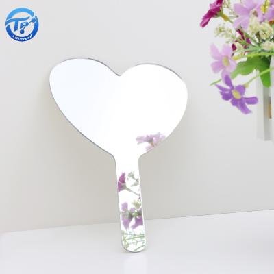 China Heart Shaped Acrylic Mirror Sheet Integrated Handle PMMA Acrylic Mirror For Beauty Salon for sale
