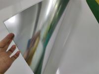 China Super Reflective PET Mirror Film Roll 1m X 50m/100m Industrial & Construction Use Extruding & Cutting Service for sale