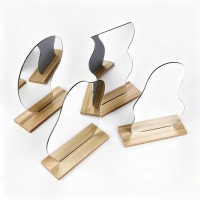 China Irregular Wavy Acrylic Mirror With Plywood Base For Makeup Gift Shop Table Decor for sale