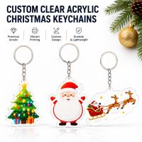 China Custom Clear Acrylic Christmas Keychains Cute Santa Claus Tree Reindeer UV Printed Xmas Keyrings for sale