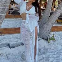 China Lace-Up Beach Dress Set with Sun Protection and Flared Long Sleeves for a Flowy Photogenic Look for sale