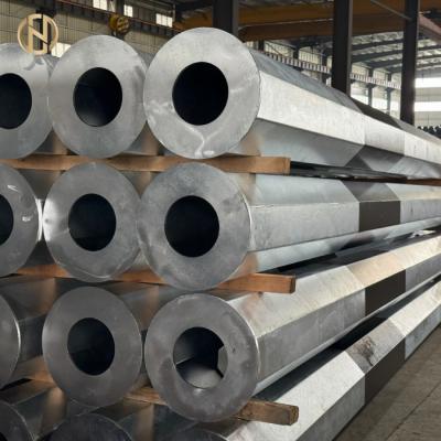 China Hot-dip Galvanized Octagonal Steel Power Pole with Circular Anti-sinking Bottom Plate for sale