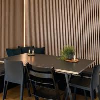 China Acoustic Slat Wood Panel 27mm 13mm Gap MDF Sound Absorbing Wall Panel 600x2400mm for sale