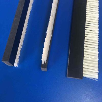 China PBT Filament Gate Shockproof Flat Lath Metal Channel Strip Brushes for sale