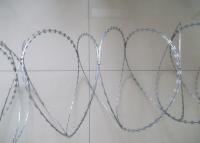 China Hot Dipped Galvanized Clips Razor Barbed Blade Wire Livestock Fence Panels for sale
