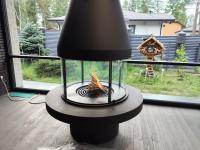 China European Style Luxury Furniture High Grade Black Modern Carbon Steel Round Table Glass Art Rotating Fireplace for sale