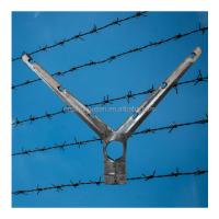 China Chain Link Fence Razor Barbed Wire Roll Barb Distance 7.5cm-15cm Barb Length 1.5-3cm for sale