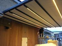 China Aluminum PVC Pergola Canopy Roof Pergola Hotels Modern Front Door Waterproof Retractable Awning for sale
