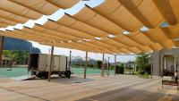 China Outdoor&indoor Motorized Wave Sliding Awning Shade Sail for sale
