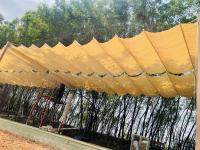 China Outdoor sliding wave sunshade canopy with HDPE fabric for sun protection and shading for sale